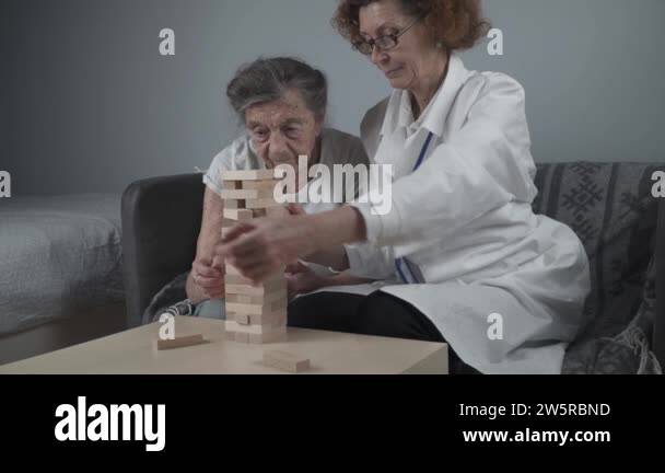 Jenga game. Theme is dementia, aging and games for old people ...