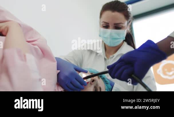 Endoscopic Operation in Hospital. African American Doctor, Medical Team ...