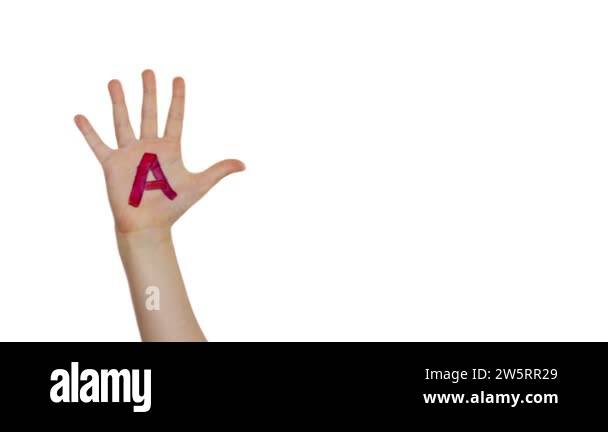 ABC alphabet letters painted on children hands. School and learning ...