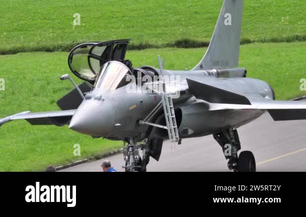 Fighter plane with open cockpit pulled on the runway by a tractor Stock ...