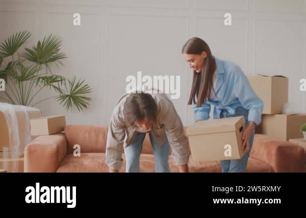 Woman carrying cardboard boxes Stock Videos & Footage - HD and 4K Video ...
