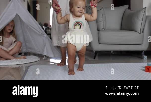 Cute caucasian Baby girl with blonde hair and blue eyes one year old ...