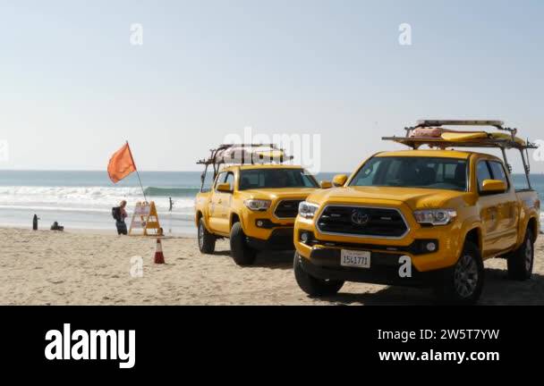 Oceanside, California USA - 8 Feb 2020: Yellow lifeguard car, beach ...