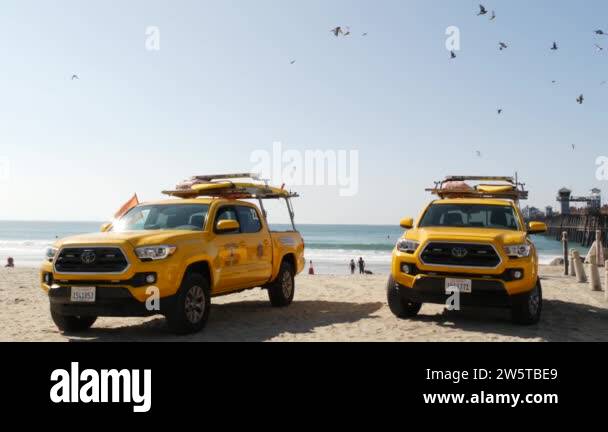 Oceanside, California USA - 8 Feb 2020: Yellow lifeguard car, beach ...
