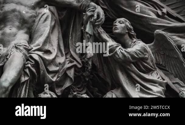 Statues of crusified Jesus and two criminal bandits filmed in close up ...