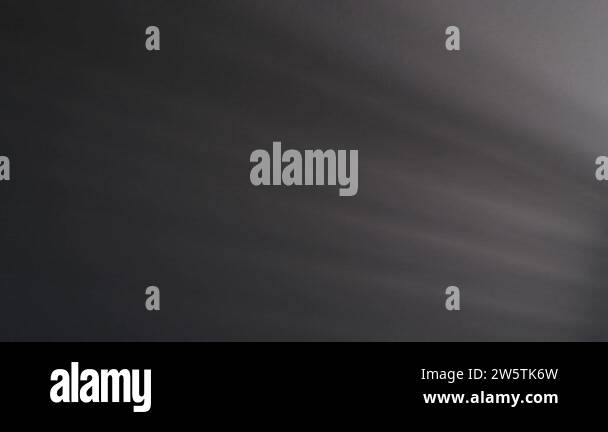 Blurry dark shadows moving on the wall. Spooky shadow art noise texture ...