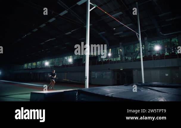 Man Pole Vault Jump Over Bar Stock Video Footage - Alamy