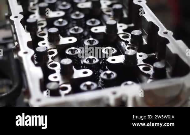repair of an engine, a gas distribution valve in a motor of a car Stock ...