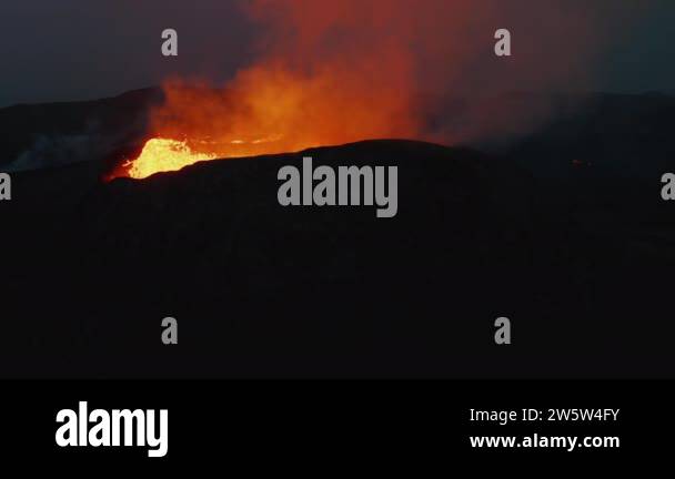 Orbit shot around active volcano crater. Hot boiling magma. Outgoing ...