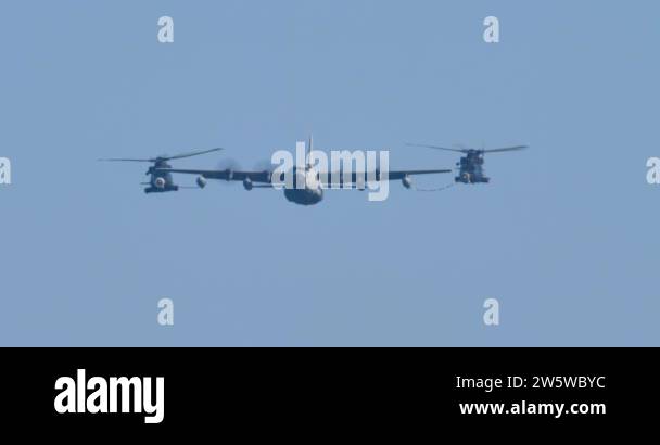 Lockheed C-130 Hercules air refueling two helicopters AgustaWestland ...