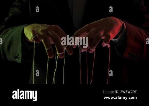 Manipulating pulling strings Stock Videos & Footage - HD and 4K Video ...