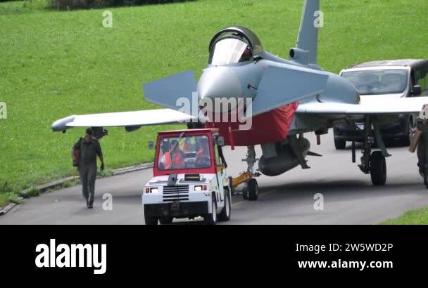 Modern military fighter jet plane towed by a tractor Stock Video ...
