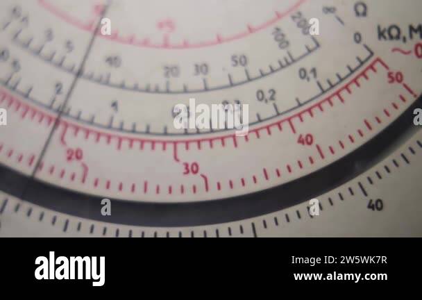 Close up. Meter Scale and Arrow. Level measurement. Ohms, decibels ...