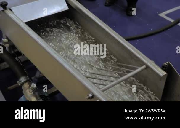 Water flow with recycled plastic granules, pellets - plastic recycling ...
