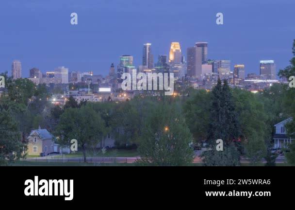 Long Exposure City Street Traffic Passes under the Urban Landscape of ...