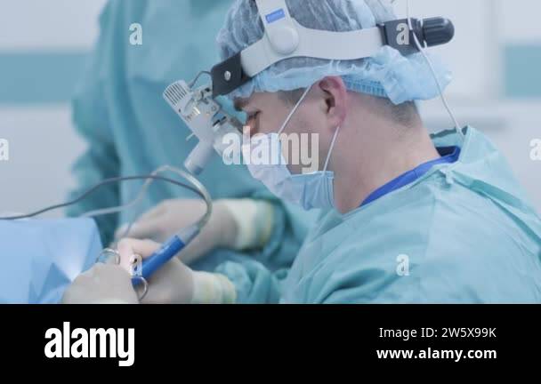 Operation of removing tonsils. tonsillectomy under deep anesthesia ...