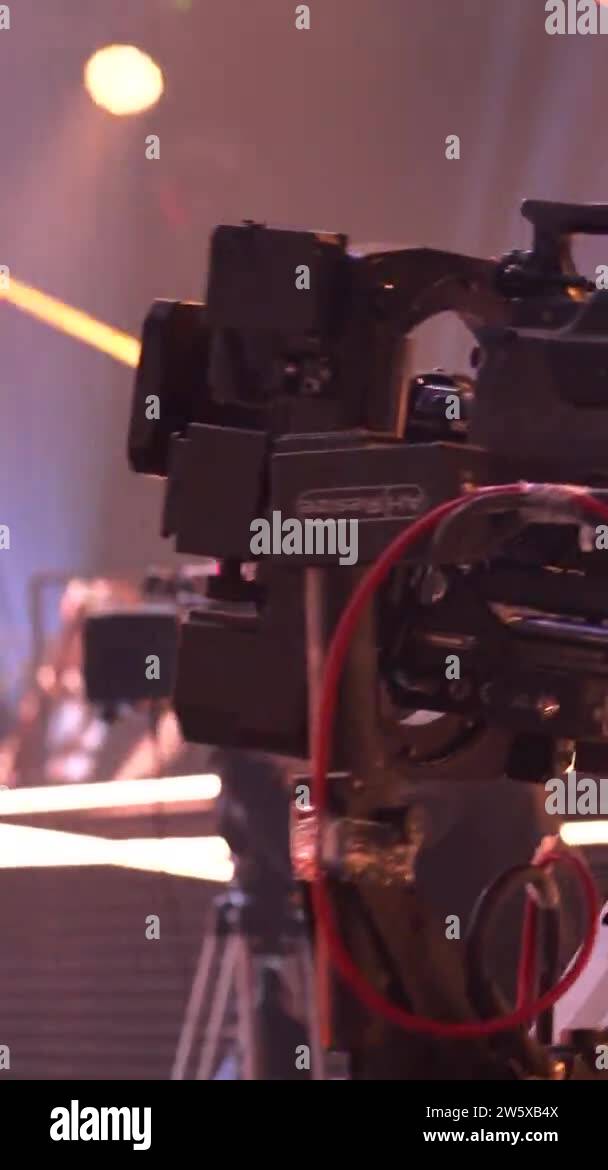People viewers in a TV studio while recording a TV show. Vertical video ...