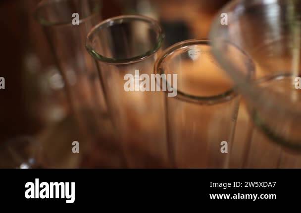 DOLLY MOVE TEST TUBES & BEAKERS: Move along row and back Stock Video ...