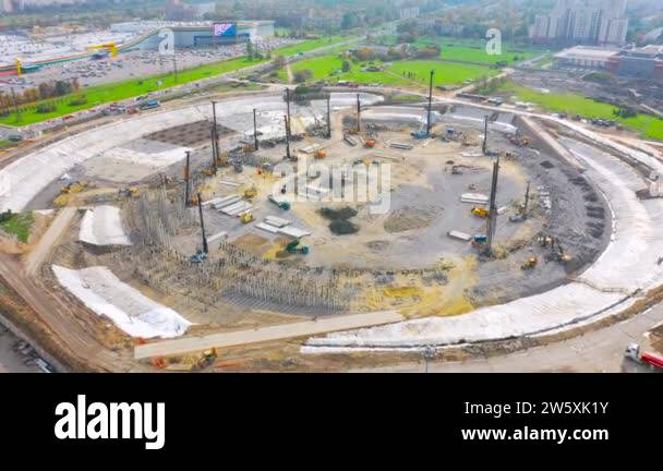 Construction of a stadium, exhibition complex, arena. Heavy machines ...