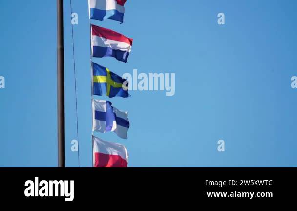 The flags of the countries of the European Union are waving against the ...