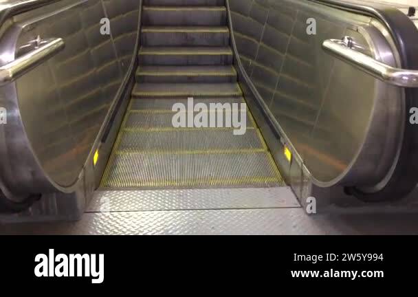 Modern luxury escalators . video of a moving excavator steps changing ...