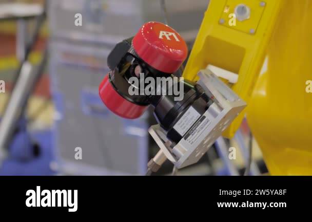 Industrial robotic arm manipulator with laser tracker camera at robot ...