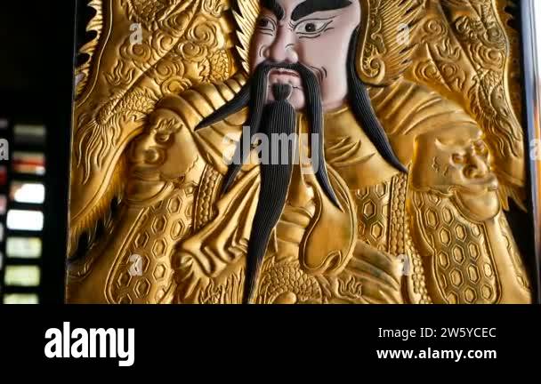 Wooden gates decorated with traditional chinese ancient holy door gods ...