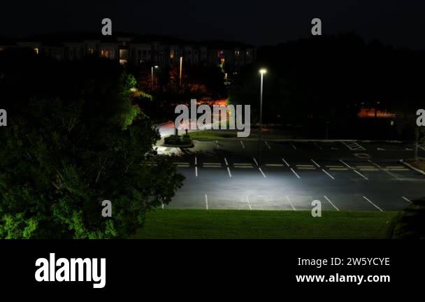 Empty car parking lot at night. Wide shot Stock Video Footage - Alamy