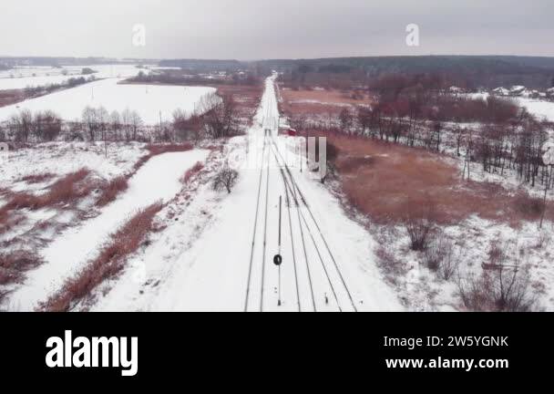 Rail link with empty railroad tracks. Railroad surrounded by forest at winter Stock Video ...