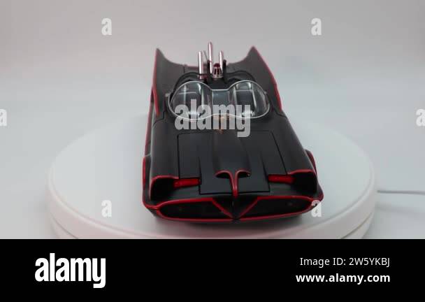 Batmobile diecast on rotating display isolated on white background ...