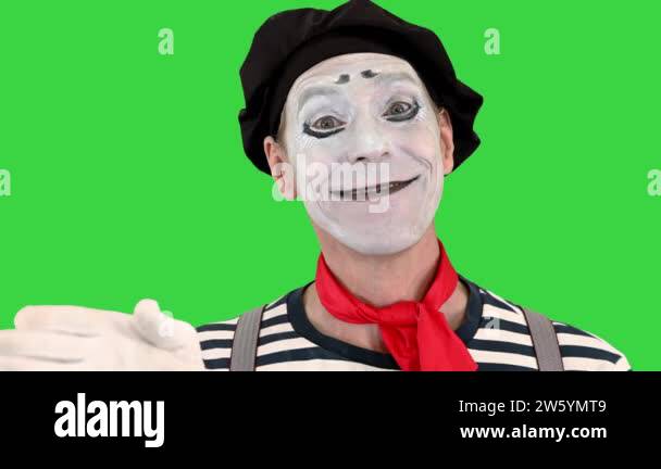 Friendly mime showing hello with his hand on a Green Screen, Chroma Key ...