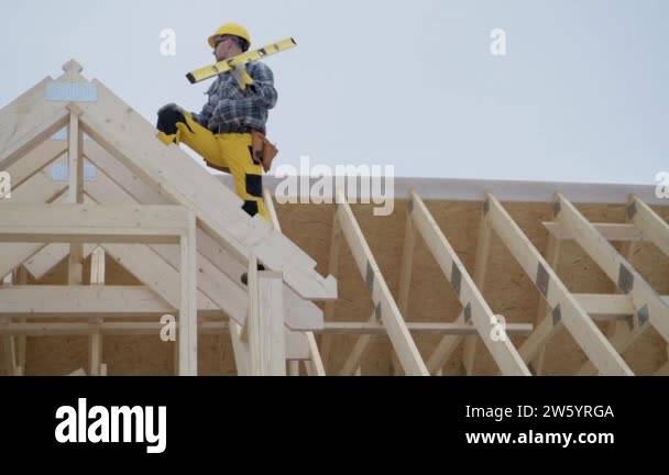 Construction Worker with Spirit Level Tool on the Newly Developed ...