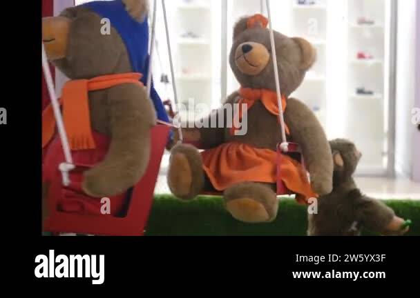 plush toys bears on a carousel moving compositions, animated funny ...