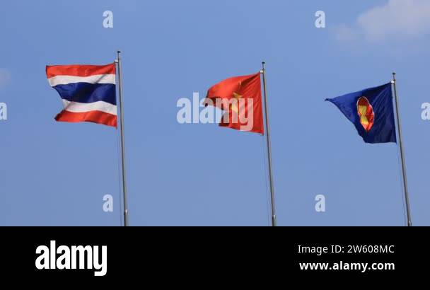National Flags of ASEAN countries behind the sky in Ho Chi Minh panning ...