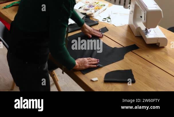 Step by step, woman dressmaker female measuring sewing pattern On Table ...