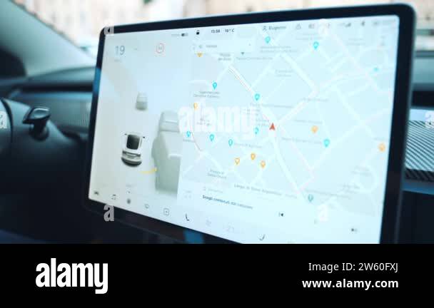 ROME, ITALY - APRIL 28, 2021: Close-up of Tesla car sensor touchscreen ...