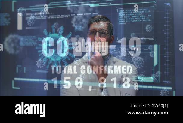 Animation of covid-19 text, virus cells, digital interface over male ...