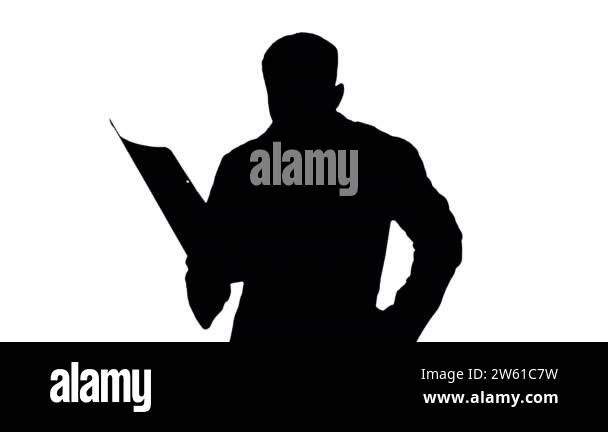 Doctor from middle east walking and looking at ct scan, Alpha Channel ...