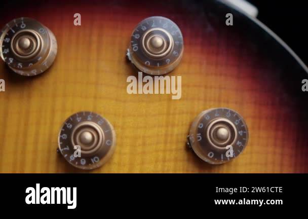 Volume and tone controls of classic wooden-like electric guitar Stock ...