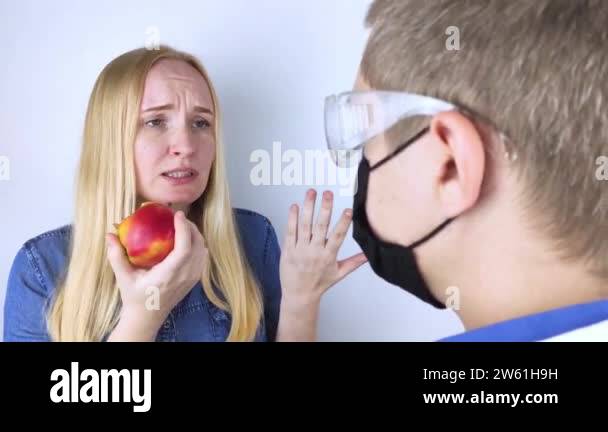 The girl complains to the doctor about the loss of smell. The doctor ...