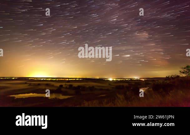 Starry night in mountains Time lapse. Milky way galaxy stars moving ...