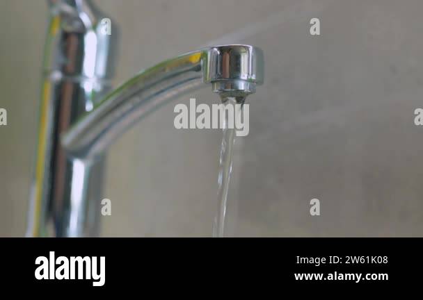 Tap Water Flows From The Tap Drinking Water At The Tap Faucet In The