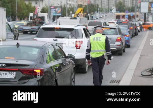 Traffic police officer works on major street in a big city Stock Video ...