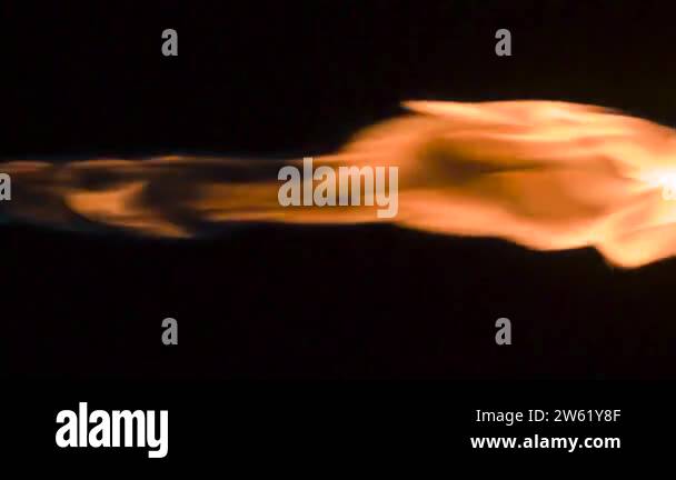 Intense Growing Fire Jet. Loop. Fiery horizontal jet with pulsating ...