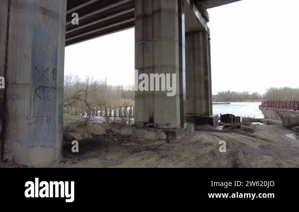 under the big bridge. Powerful iron bridge structure, View from below.A ...
