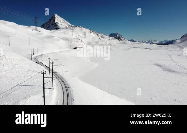 Switzerland Alps , Saint Moritz February 2021 - Bernina Express, red ...