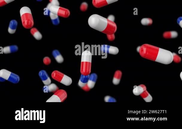 Medical capsules red-white and white-blue falling to the bottom on a ...