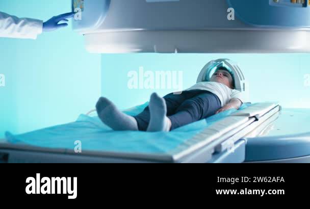 Boy during brain MRI scanning in hospital Stock Video Footage - Alamy