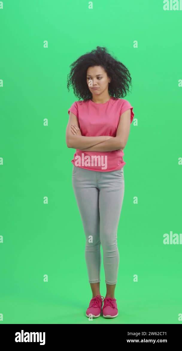Portrait of young female African American waves head no, then breaks ...