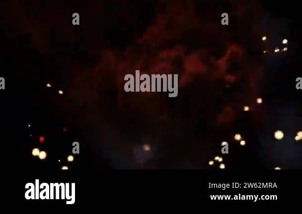 Inferno burst red fire flame with black smock moving to the right ...